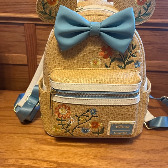 Loungefly | Bags | Disney Lounge Fly Tan And Blue Floral Backpack ...